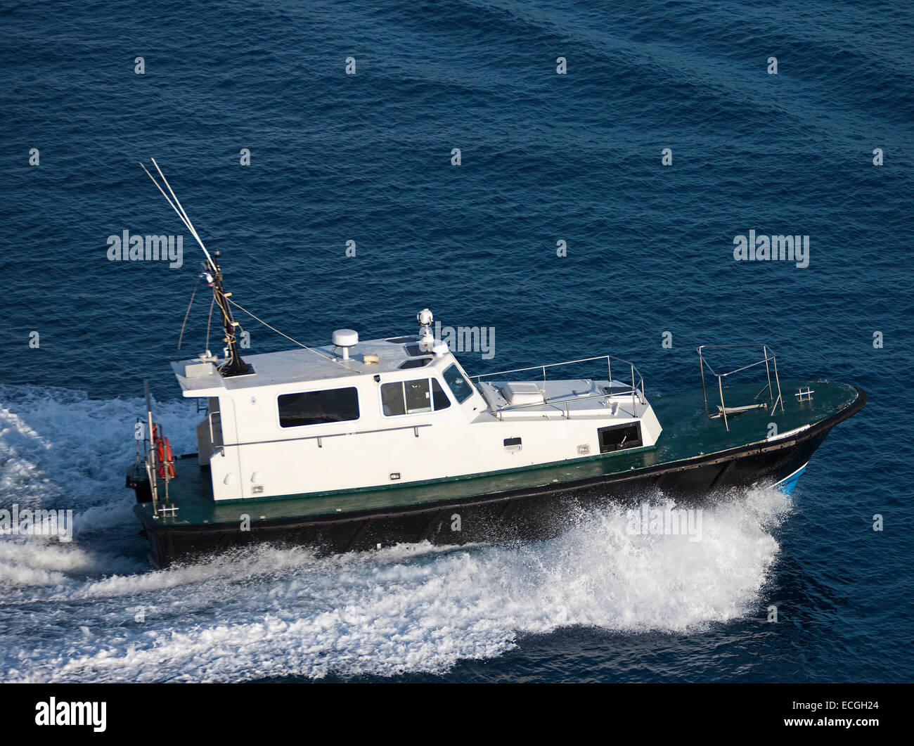 Pilot boat in Caribbean sea Stock Photo - Alamy