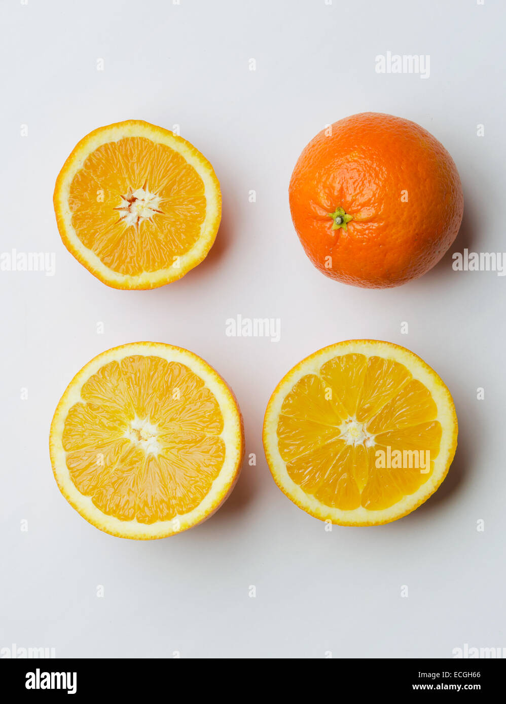 Orange fruits over white table, above view Stock Photo - Alamy
