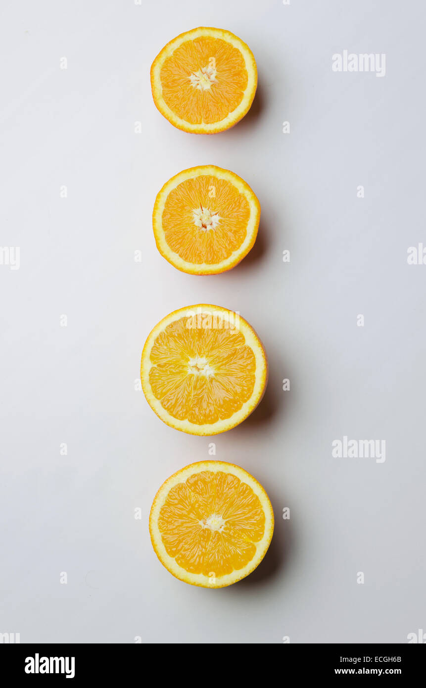 Orange fruits over white table, above view Stock Photo - Alamy