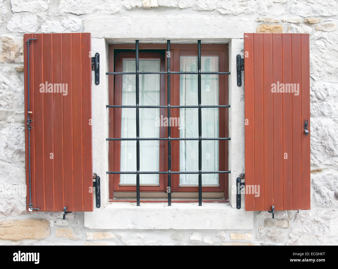 wooden window with metal window grid Stock Photo - Alamy