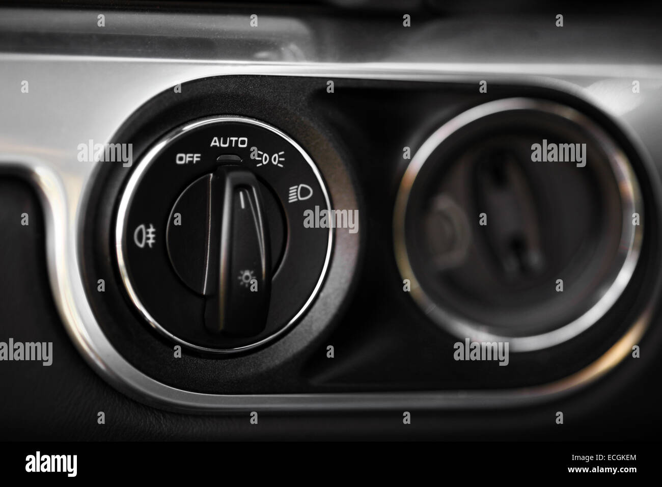 Detail of the headlight button in a car Stock Photo - Alamy