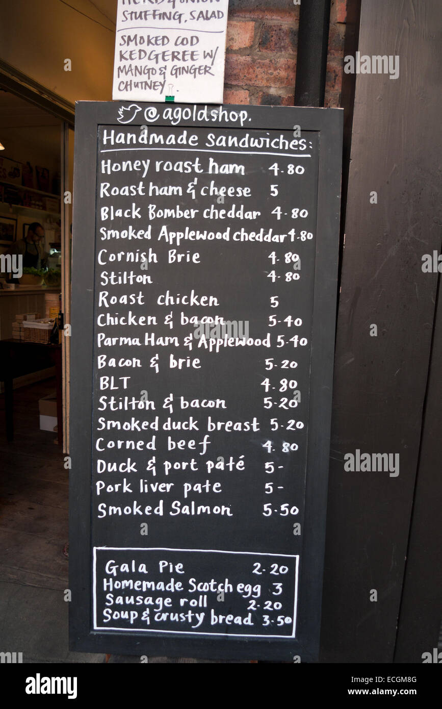 A. Gold Traditional British Food shop sandwich board in Spitalfields ...