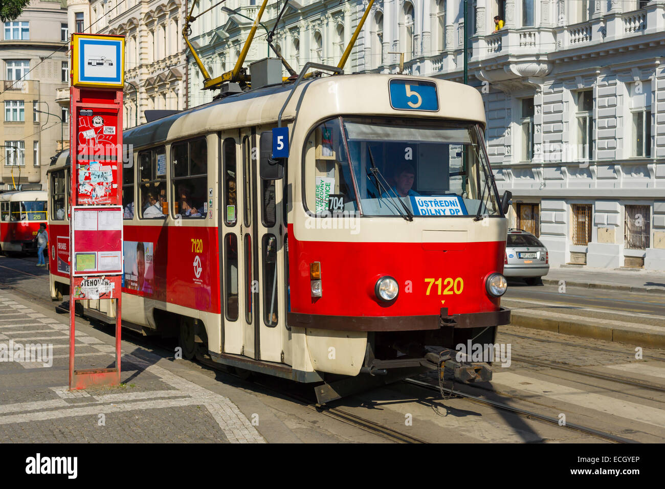The city tram on the street. Prague is the capital and largest city of ...
