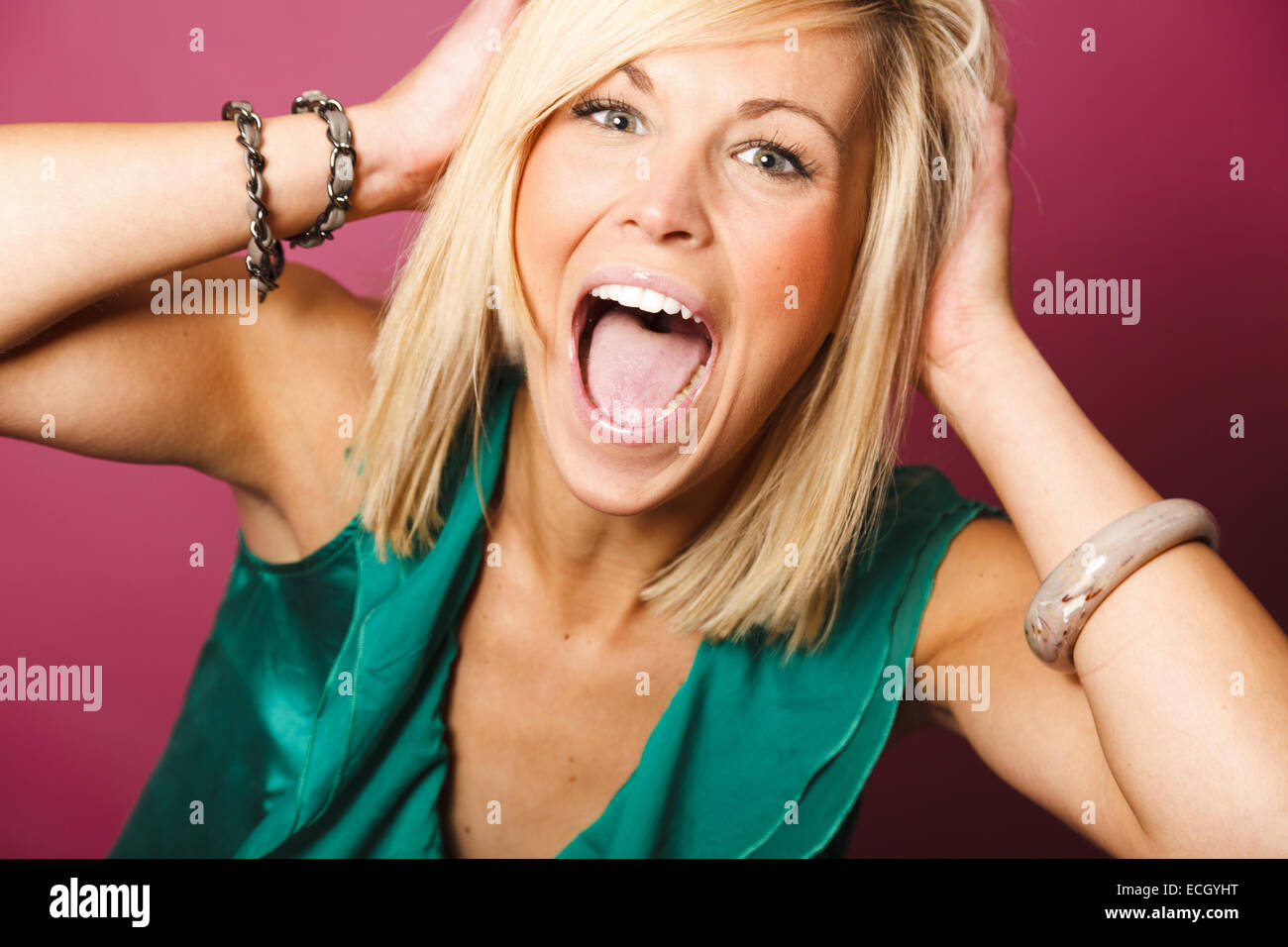 beautiful young woman shouting Stock Photo - Alamy