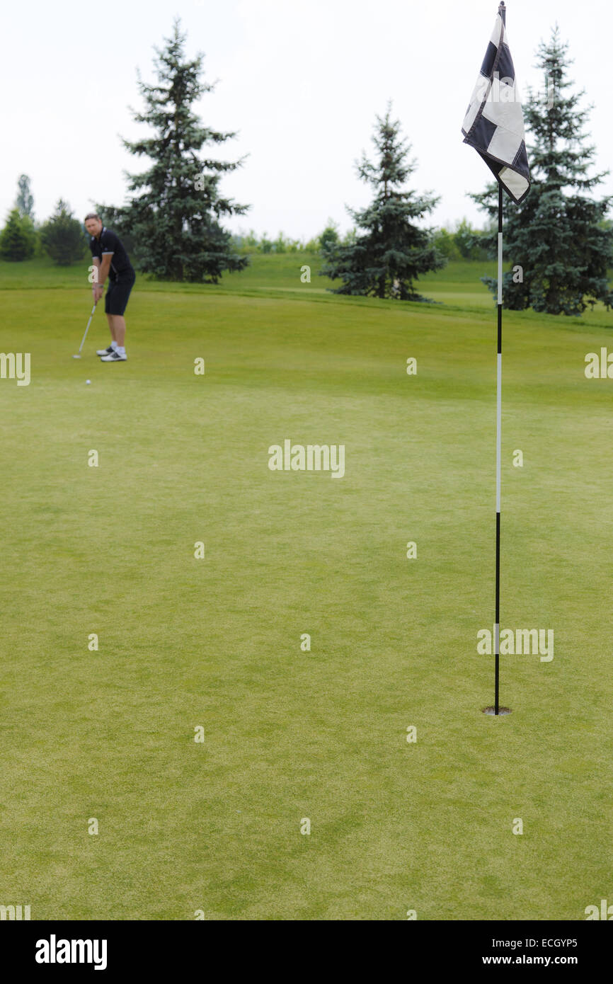 pin on golf course Stock Photo - Alamy