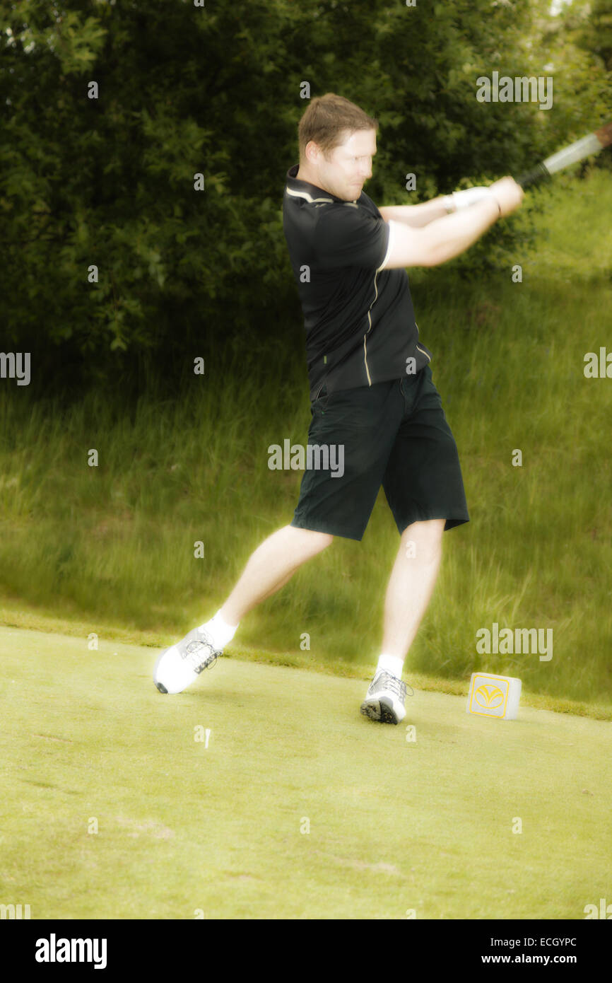 man playing golf Stock Photo - Alamy