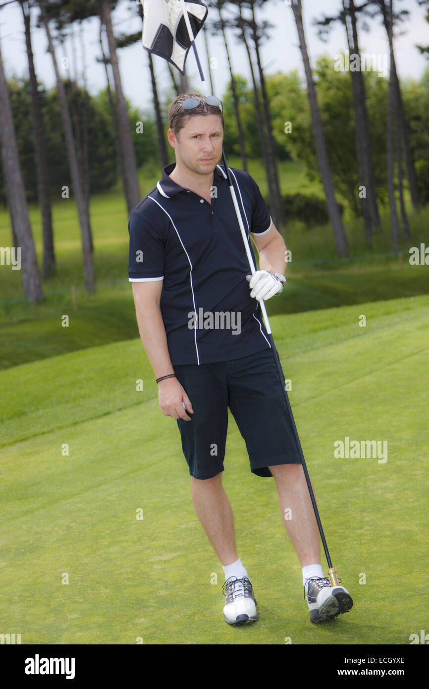 man playing golf Stock Photo - Alamy