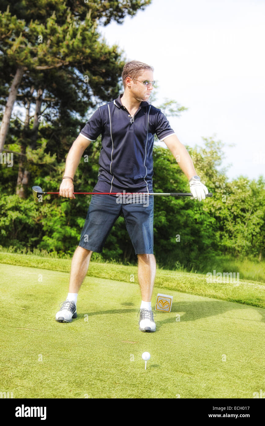 man playing golf Stock Photo - Alamy