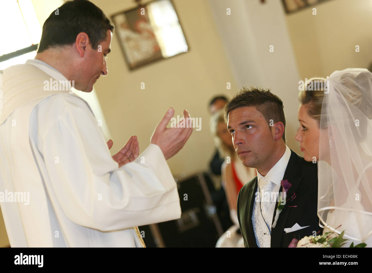 bridal couple in church Stock Photo - Alamy