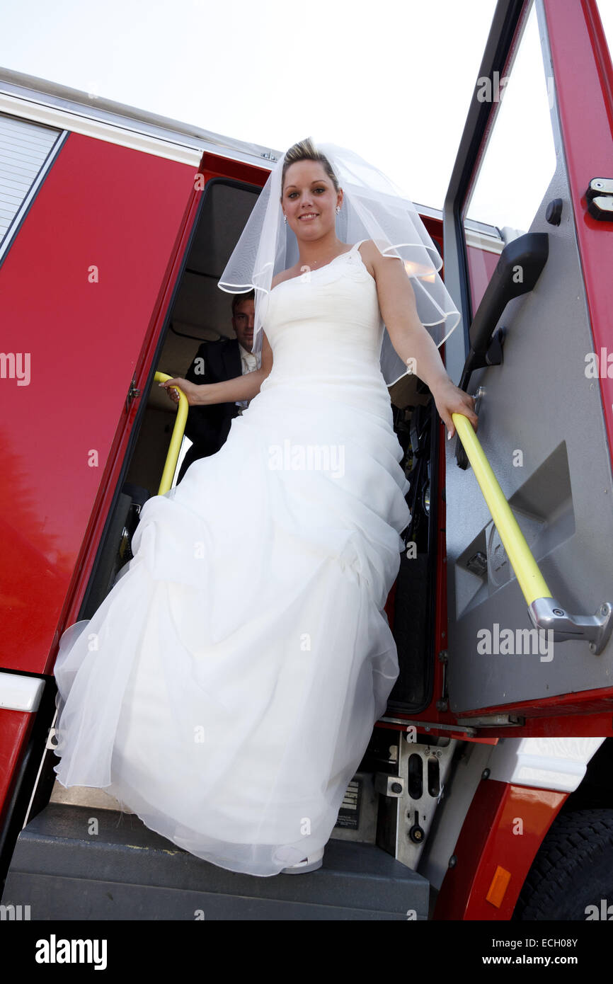 bride in fire truck Stock Photo - Alamy