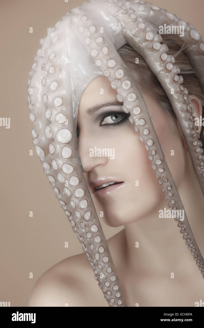 young woman with octopus on head Stock Photo - Alamy