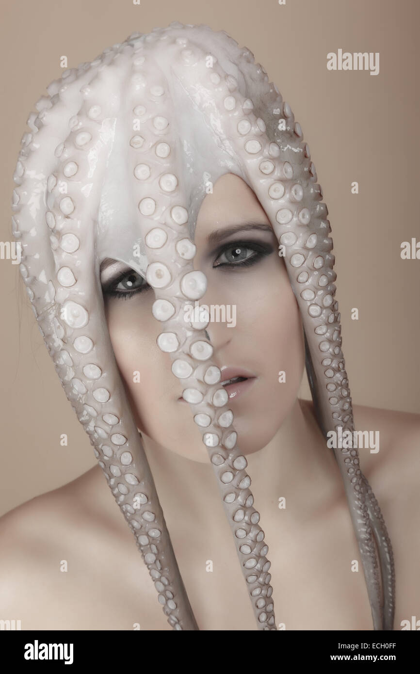 Young woman octopus on head hi-res stock photography and images - Alamy