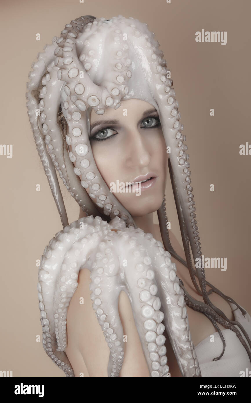 young woman with octopus on head Stock Photo - Alamy