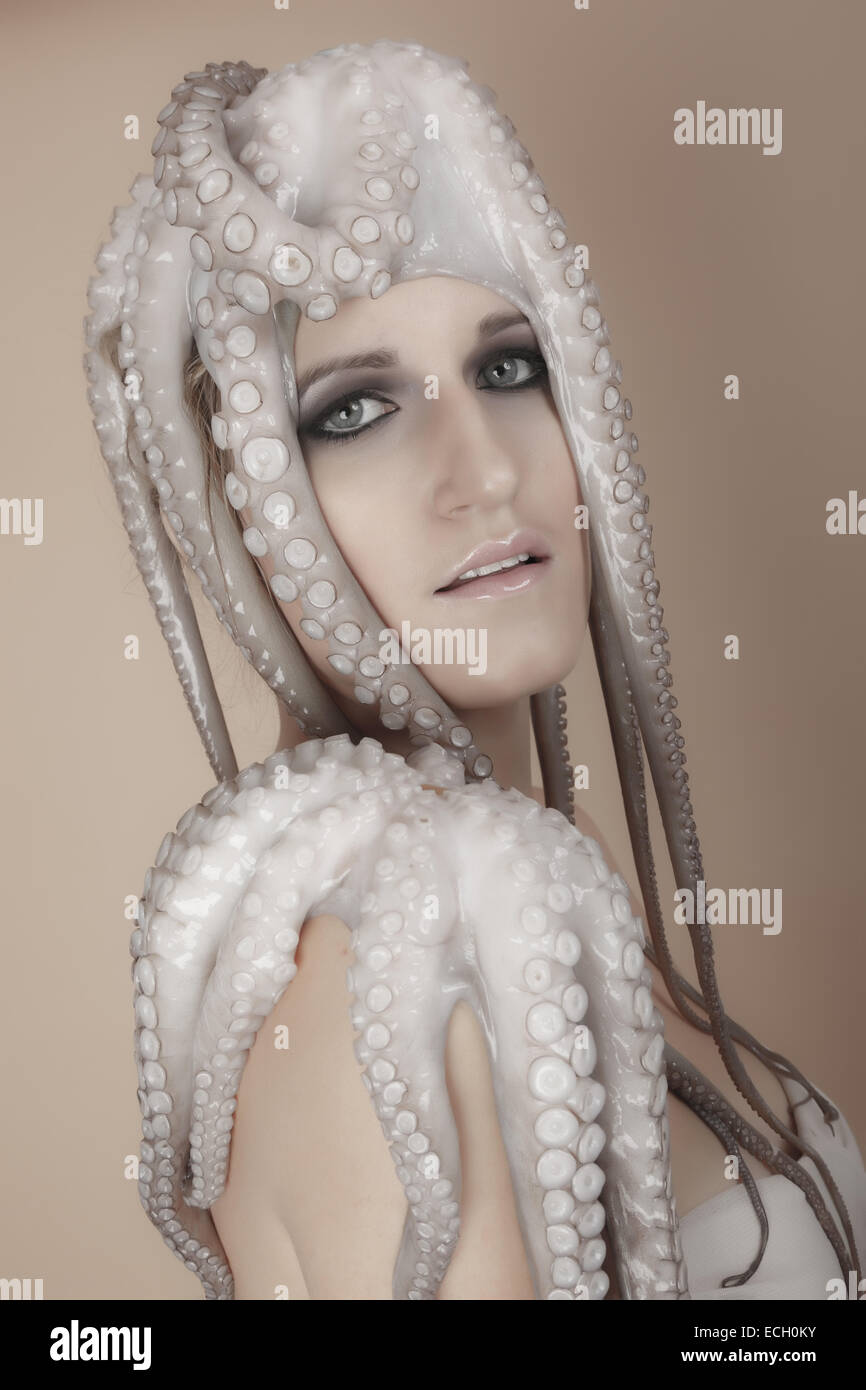 young woman with octopus on head Stock Photo - Alamy