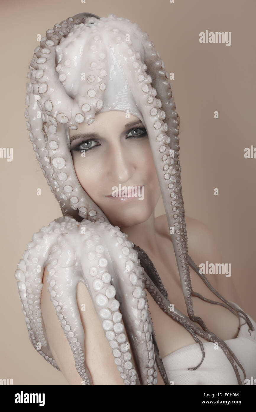 young woman with octopus on head Stock Photo - Alamy
