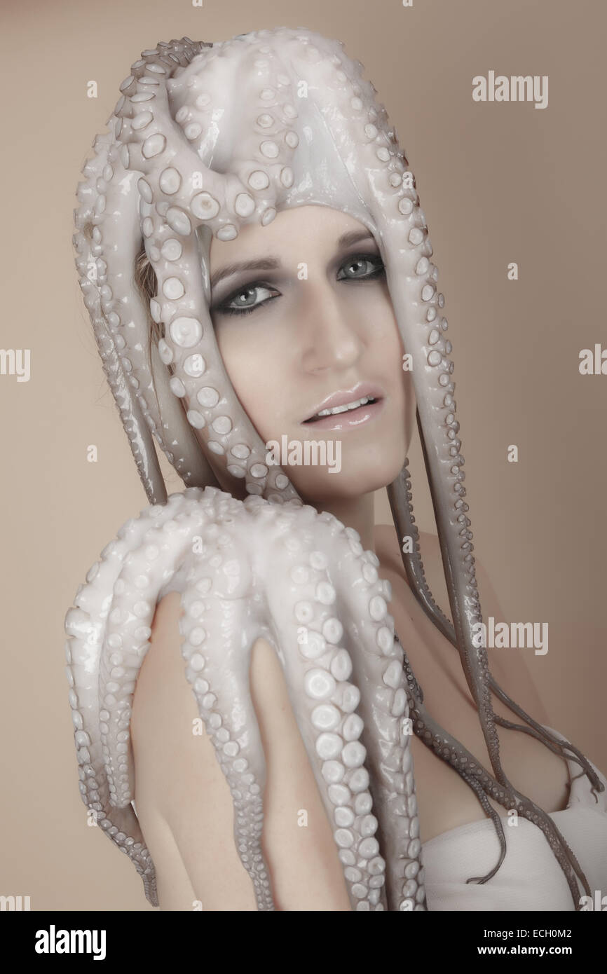 young woman with octopus on head Stock Photo - Alamy