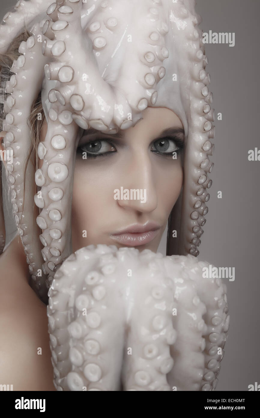 young woman with octopus on head Stock Photo - Alamy