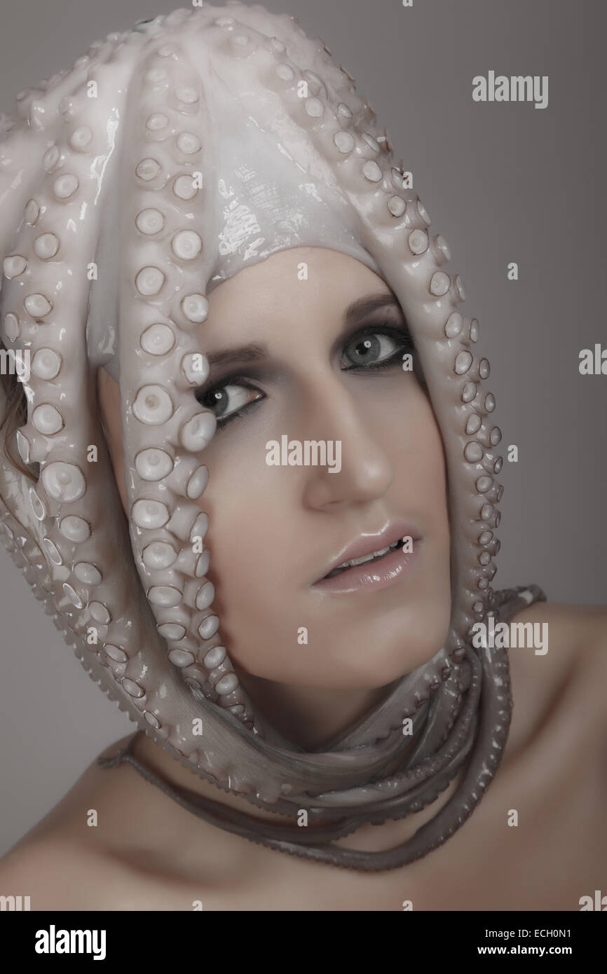 Young woman octopus on head hi-res stock photography and images - Alamy
