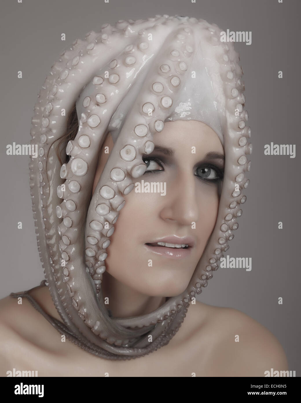 young woman with octopus on head Stock Photo - Alamy