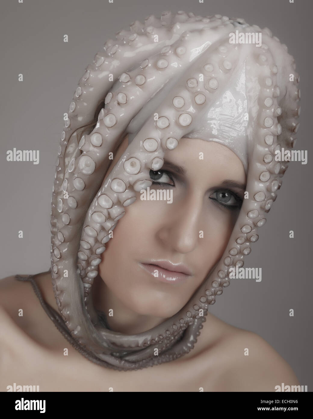 Young woman octopus on head hi-res stock photography and images - Alamy