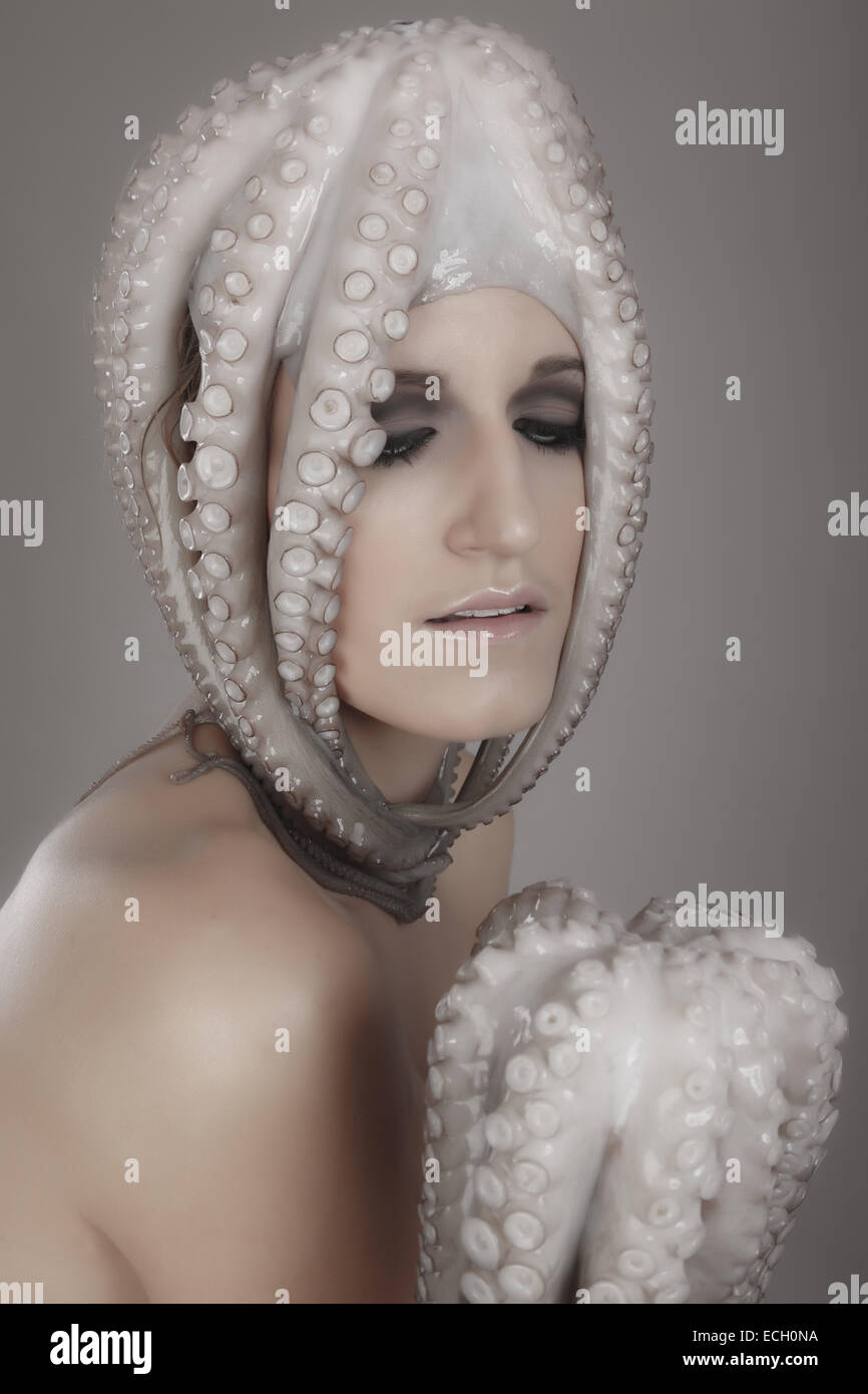 Young woman octopus on head hi-res stock photography and images - Alamy