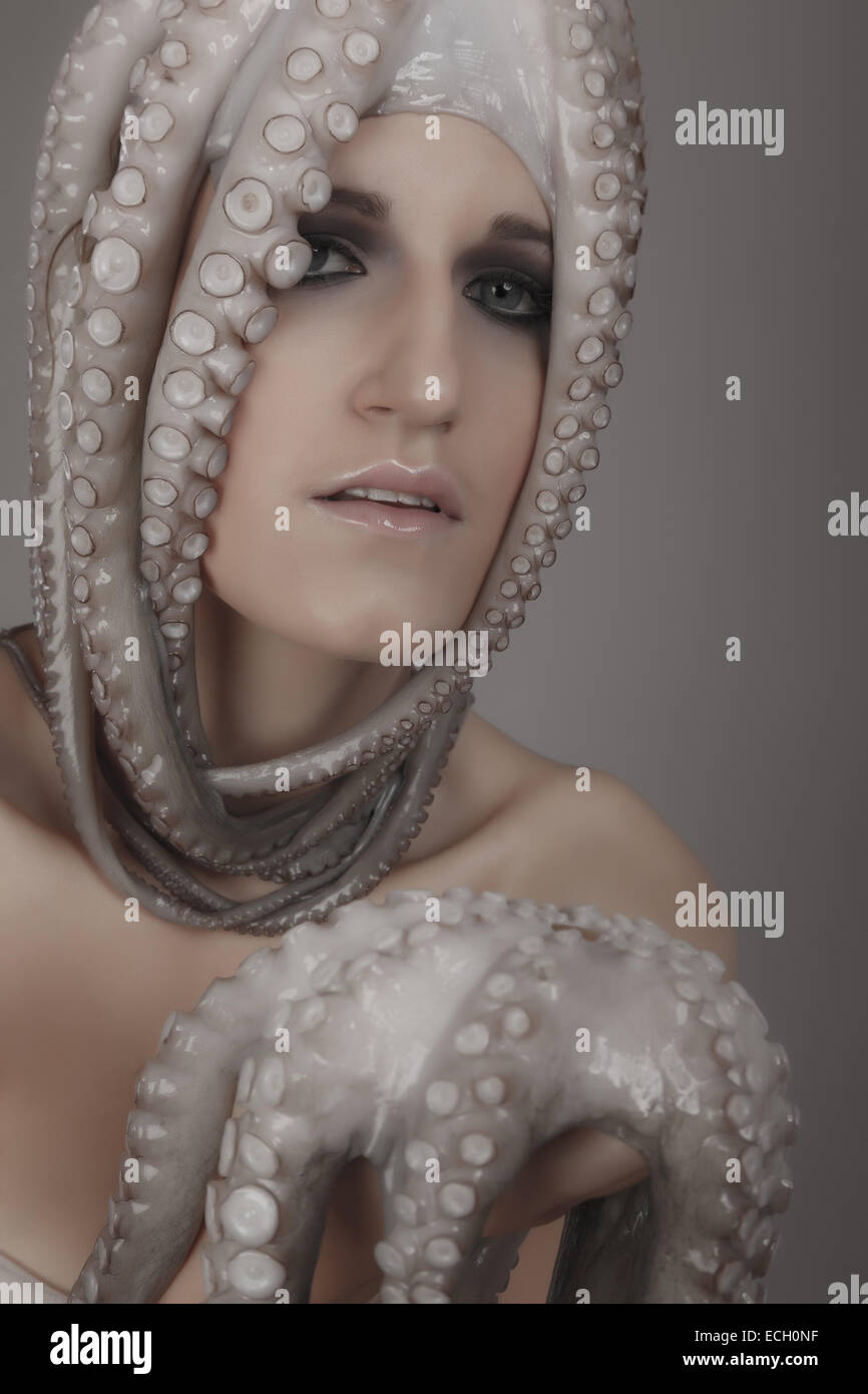 Young woman octopus on head hi-res stock photography and images - Alamy