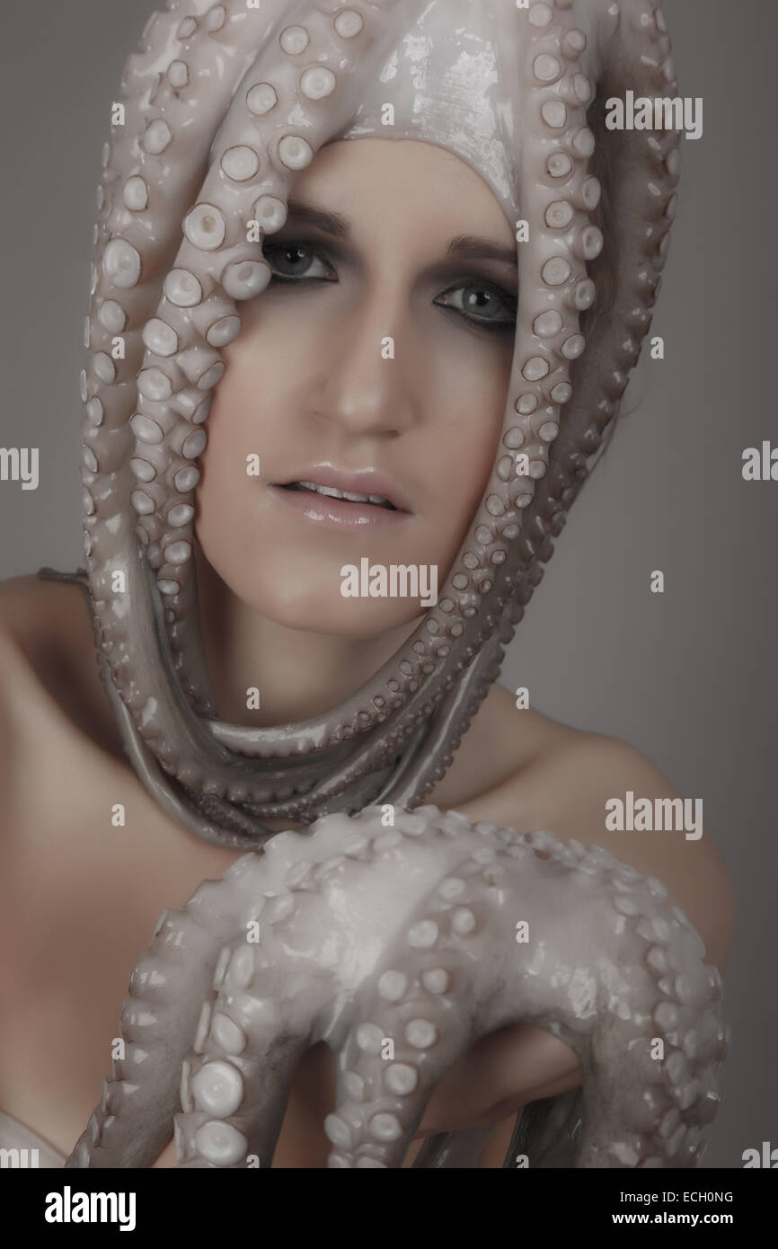 Young woman octopus on head hi-res stock photography and images - Alamy