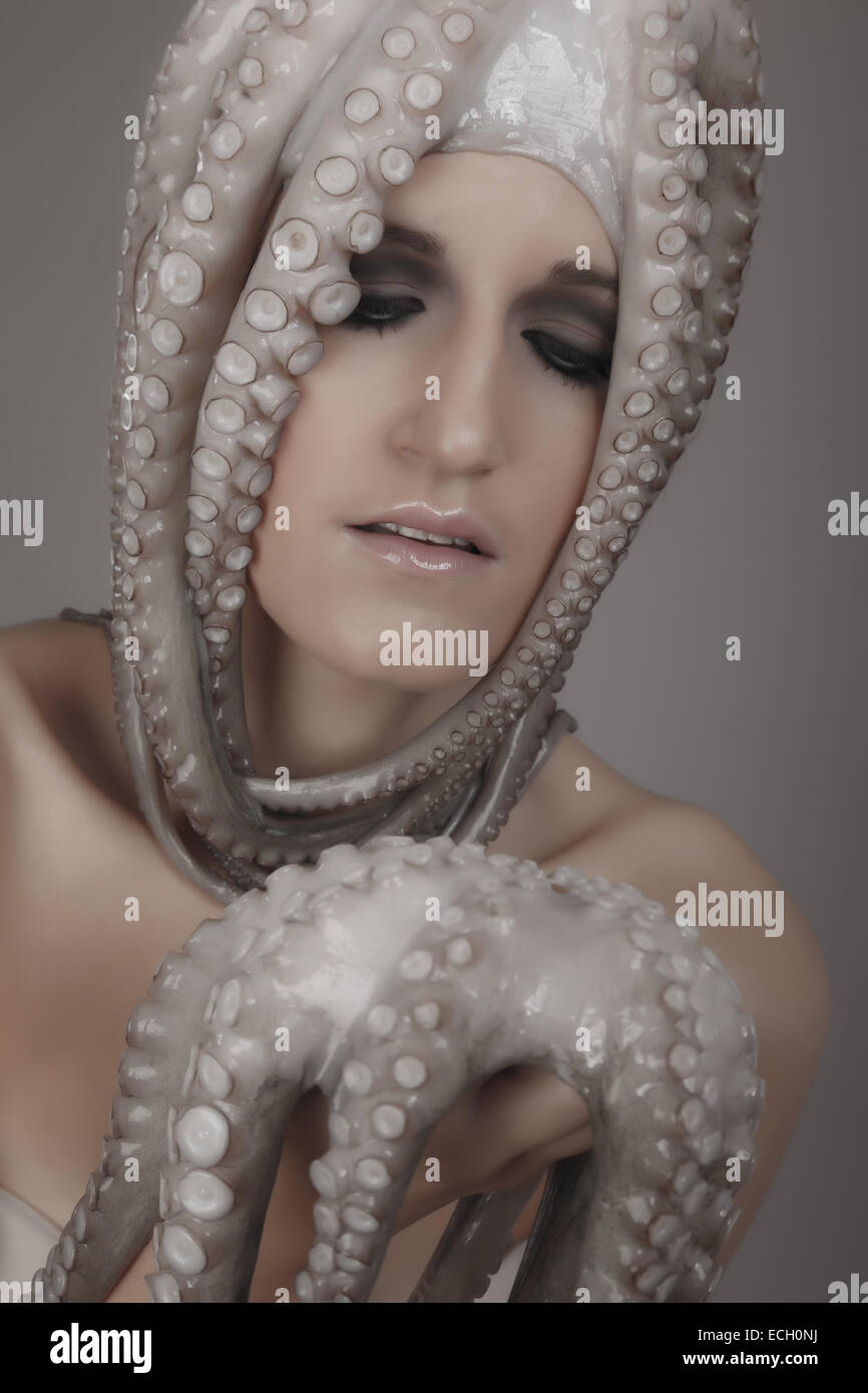 Young woman octopus on head hi-res stock photography and images - Alamy