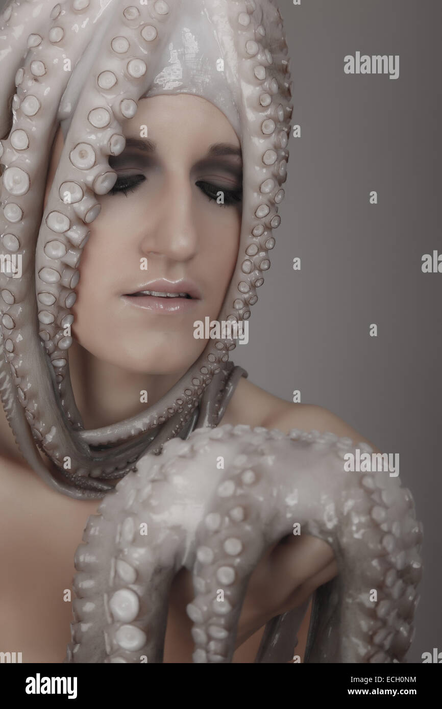 young woman with octopus on head Stock Photo - Alamy