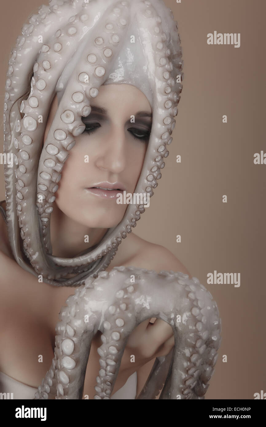 Young woman octopus on head hi-res stock photography and images - Alamy
