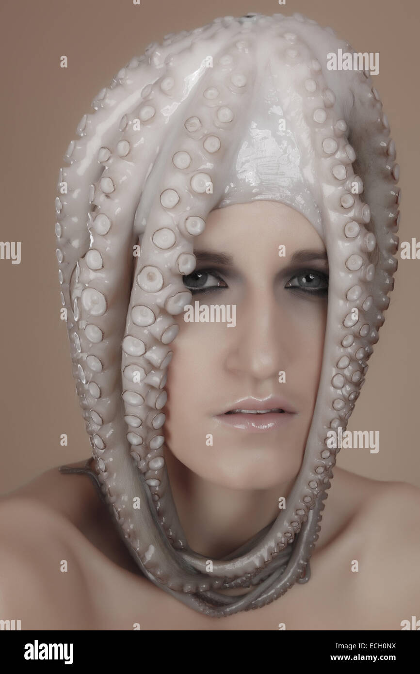 Young woman octopus on head hi-res stock photography and images - Alamy