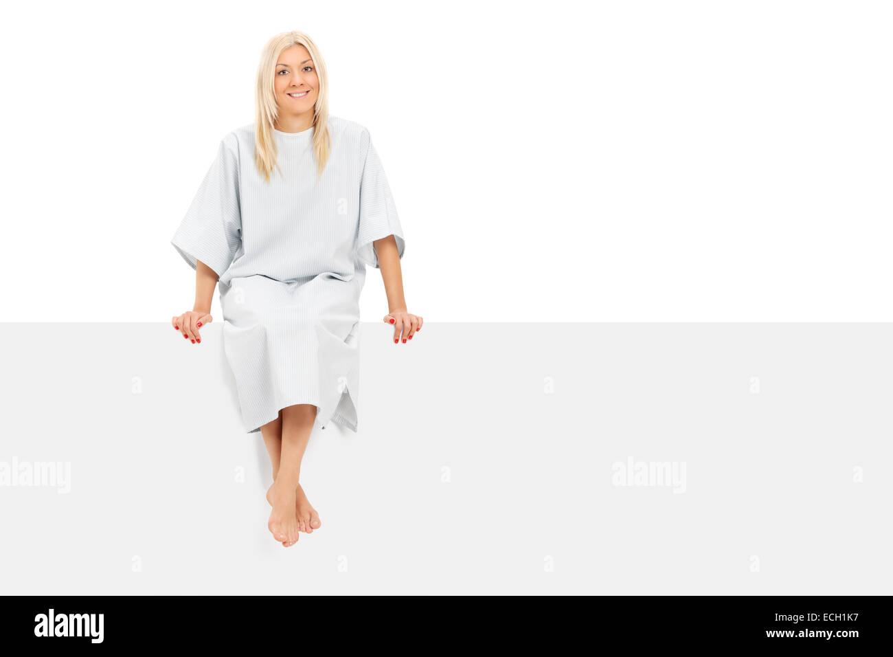 Female patient sitting on a blank signboard isolated on white ...