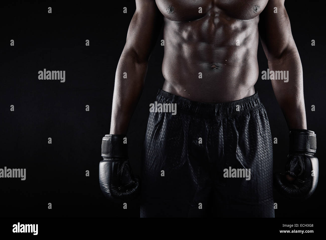 Closeup image of torso of young African male boxer wearing boxing ...