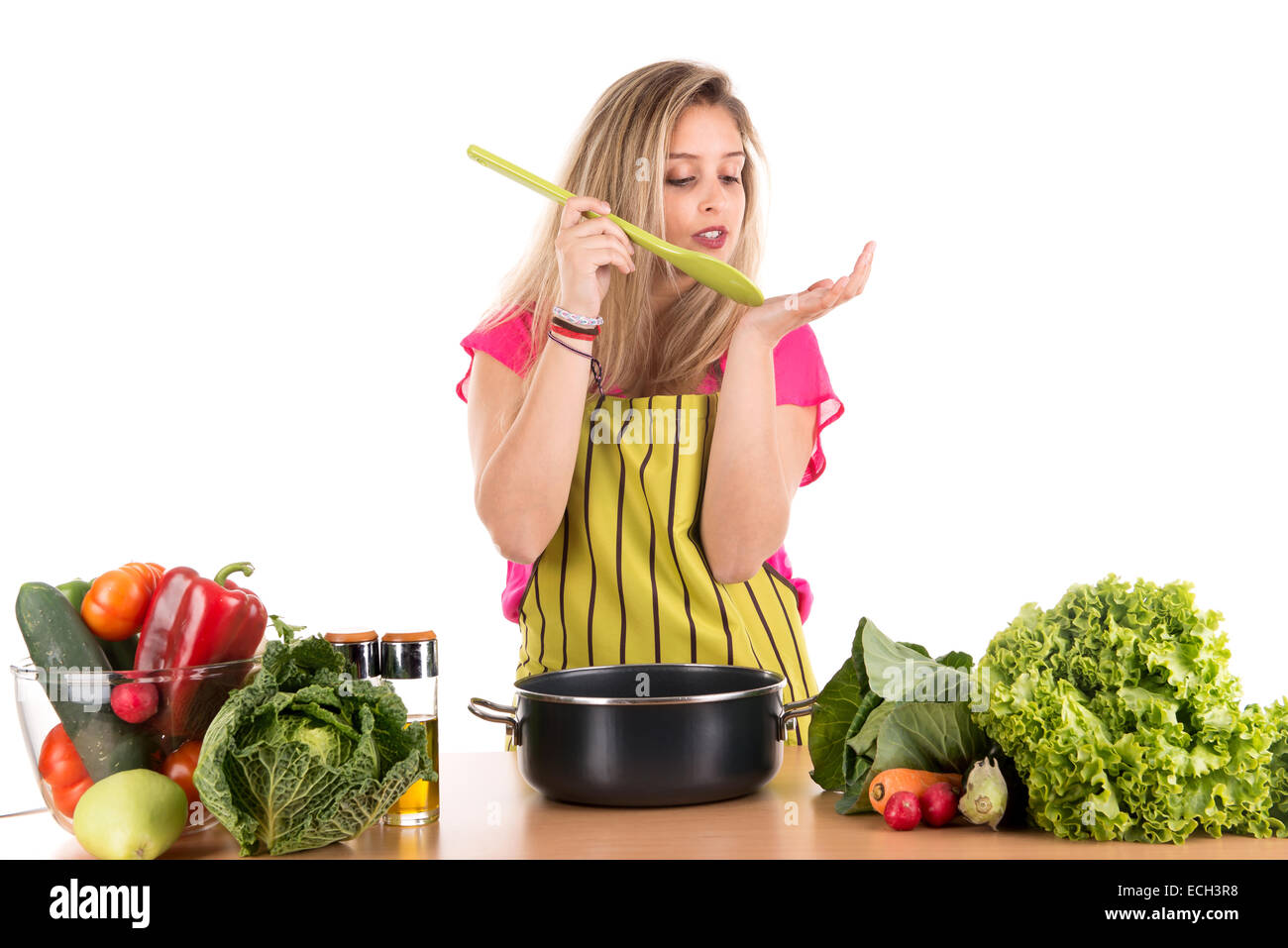 Beautiful woman cooking in the kitchen Stock Photo - Alamy