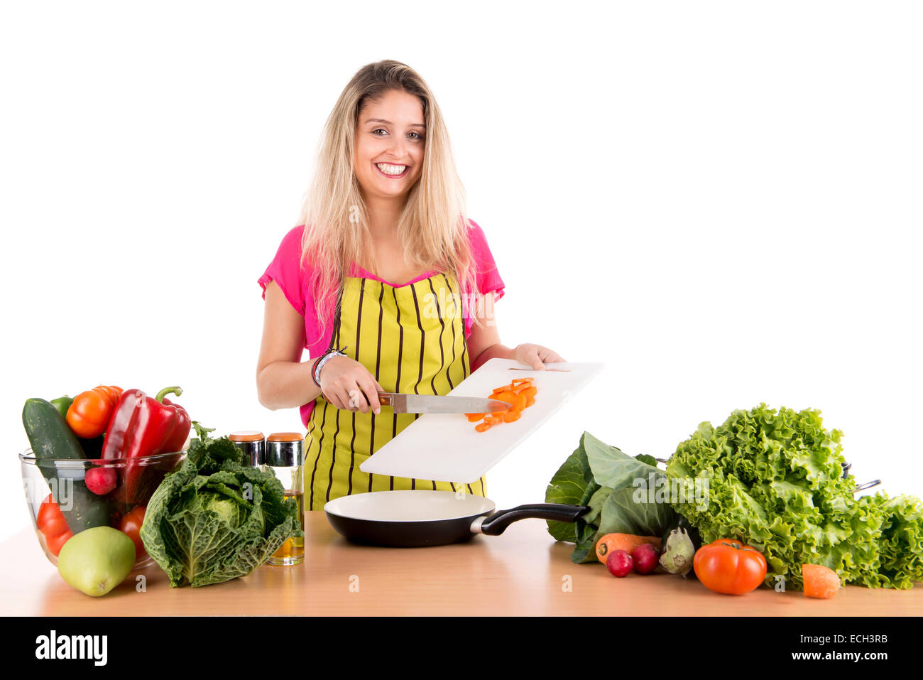 Beautiful woman cooking in the kitchen Stock Photo - Alamy