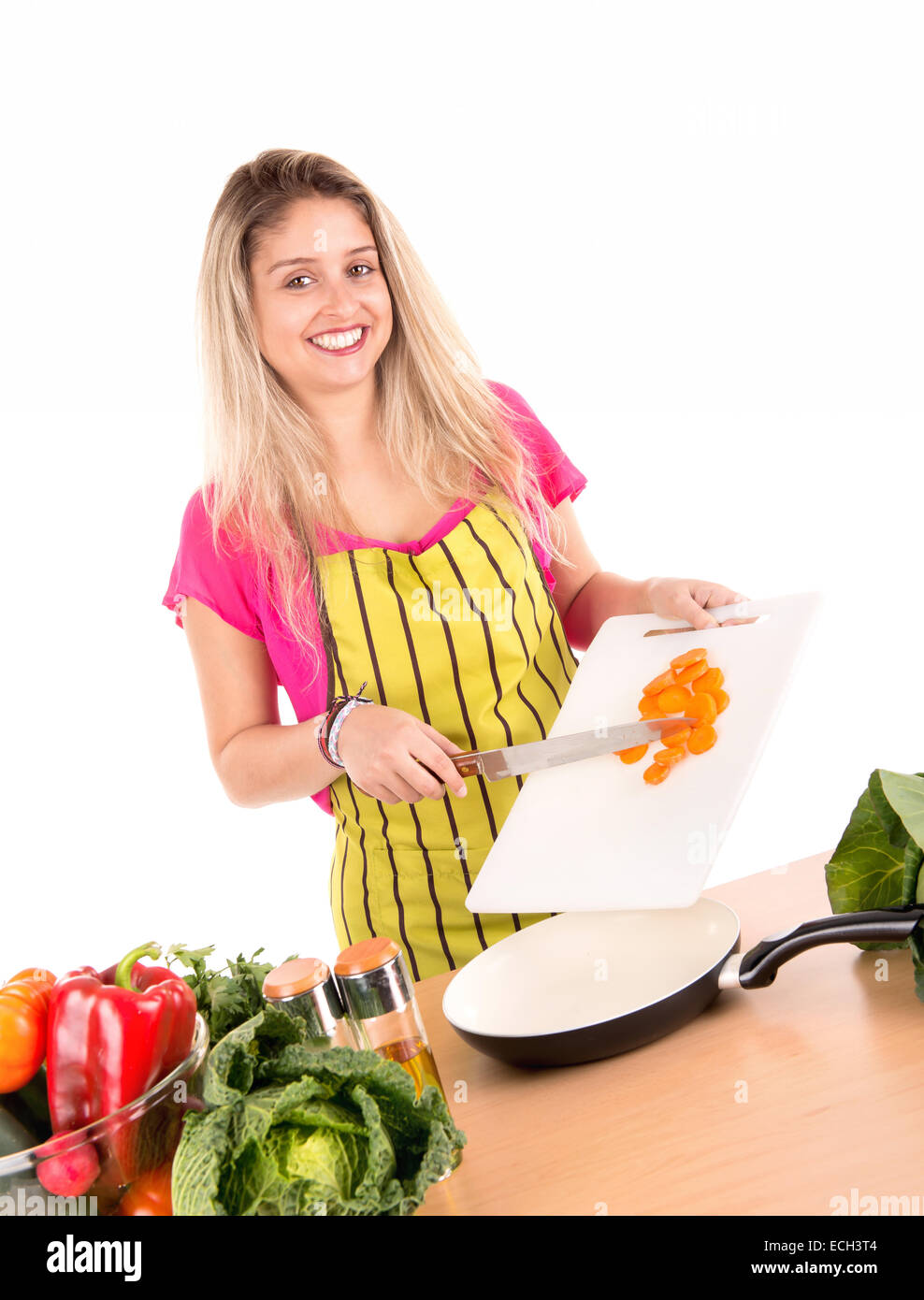Beautiful woman cooking in the kitchen Stock Photo - Alamy