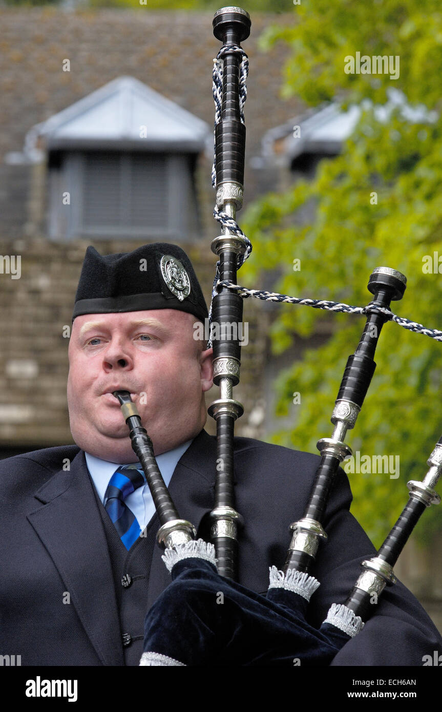 Man playing bagpipes during hi-res stock photography and images - Alamy