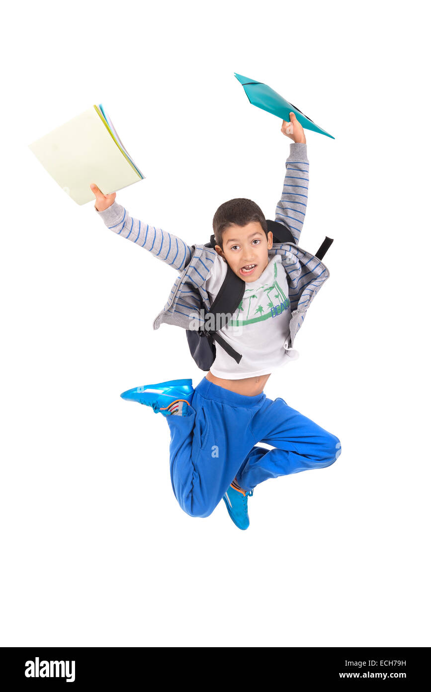 Young boy student jumping isolated in white Stock Photo - Alamy