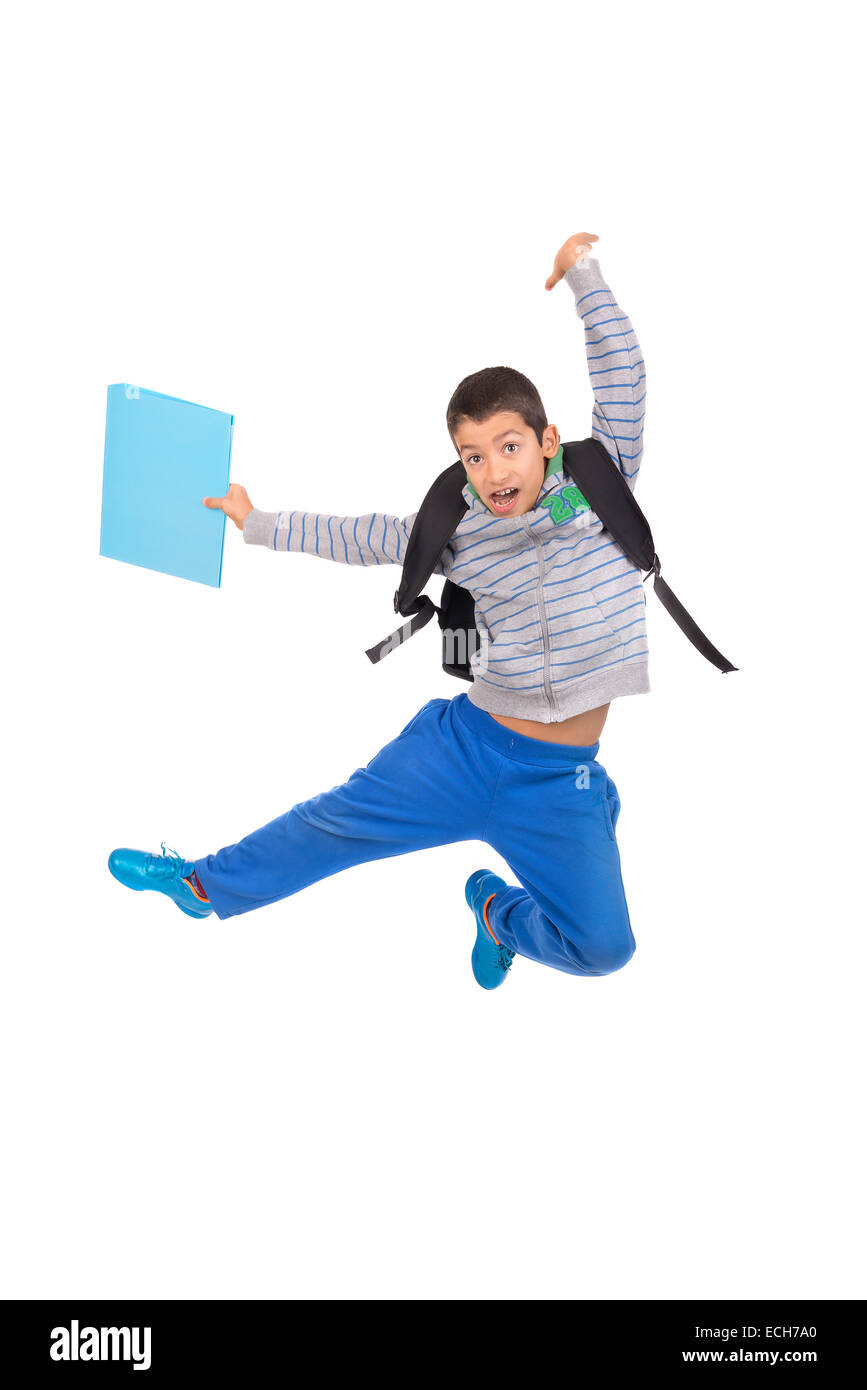 Young boy student jumping isolated in white Stock Photo - Alamy