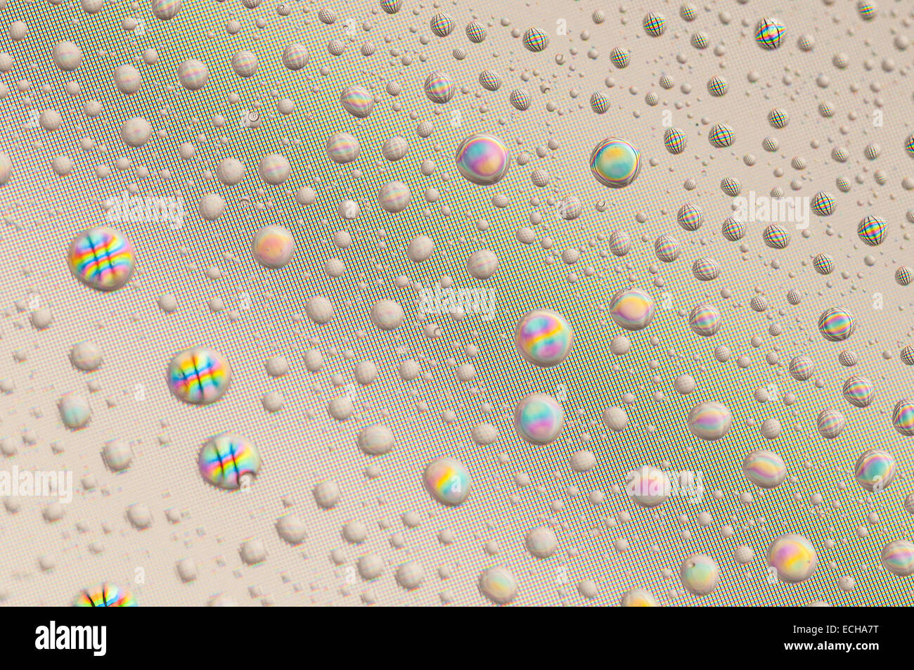 Water droplets on a computer screen. Abstract patterns an be useful for ...