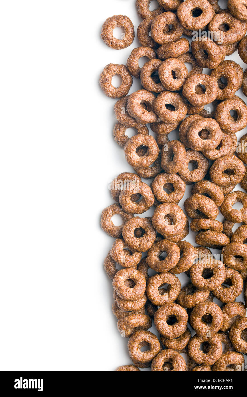 chocolate cereal rings on white background Stock Photo - Alamy