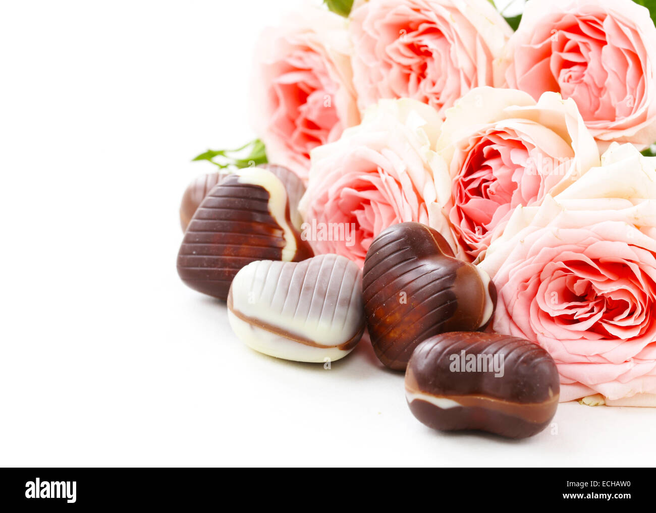 chocolate candy hearts and pink roses for Valentine's day holiday Stock ...