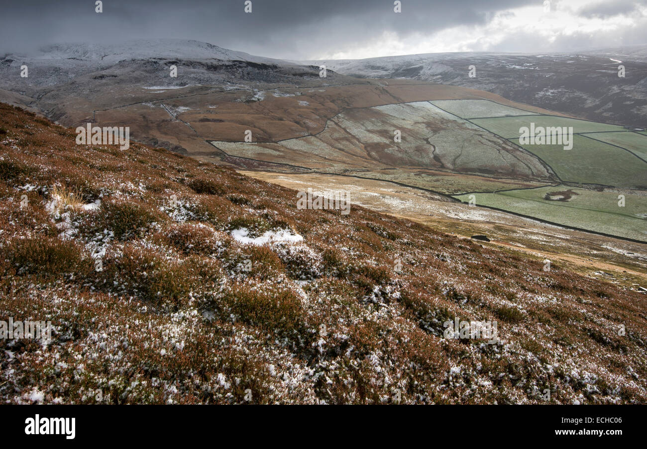 Early winter snow on the hills above Glossop in the High Peak area of ...