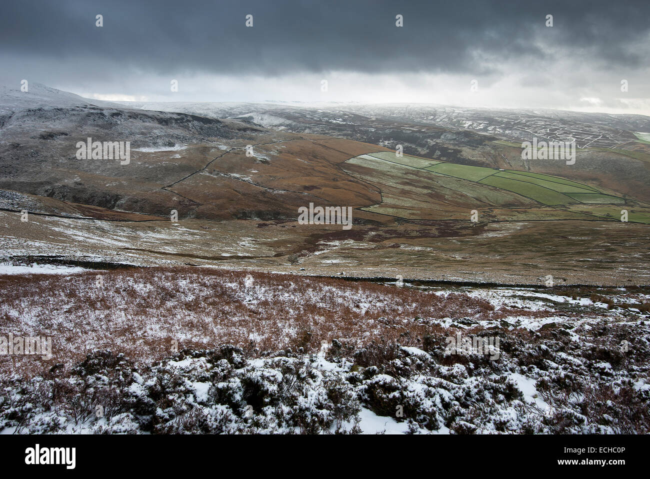 Early winter snow on the hills above Glossop in the High Peak area of ...
