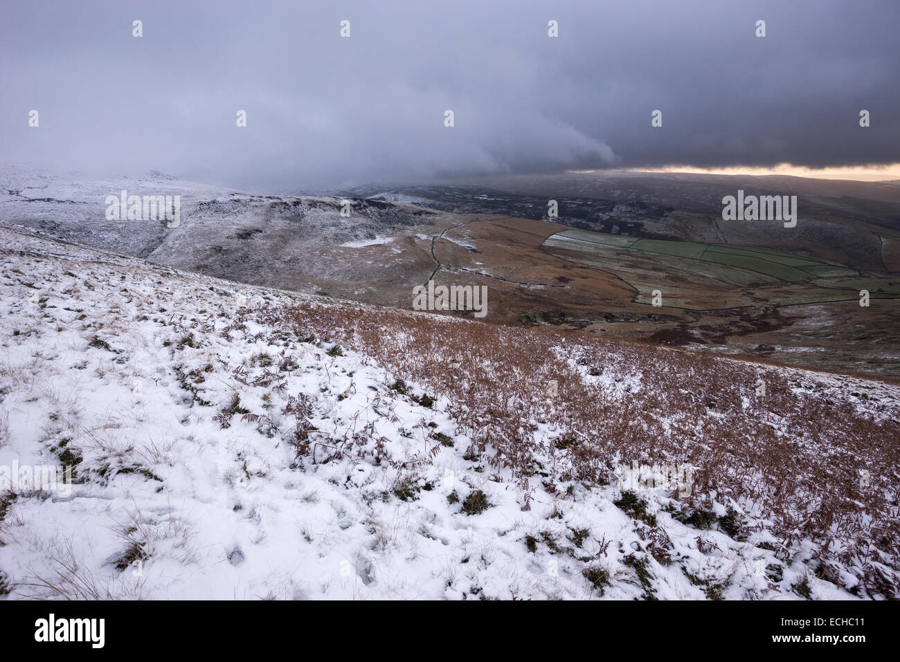 Early winter snow on the hills above Glossop in the High Peak area of ...