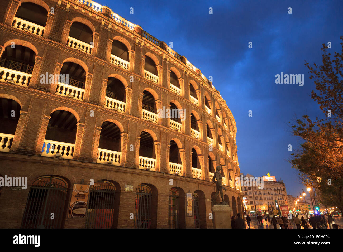Exterior of the Bullring Plaza de Toros Valencia lit up on a wet rainy ...