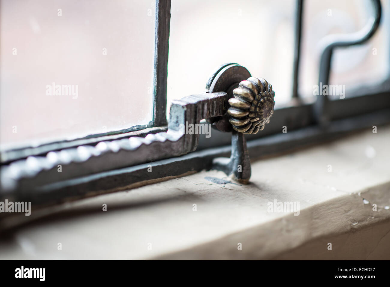 Decorative antique window stay Stock Photo - Alamy