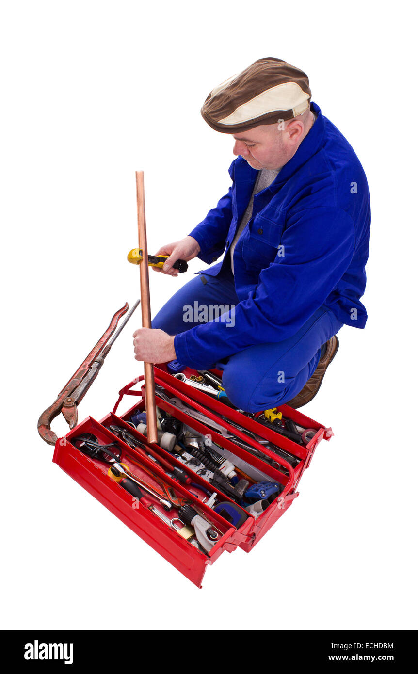 A plumber cutting copper tubing Stock Photo - Alamy