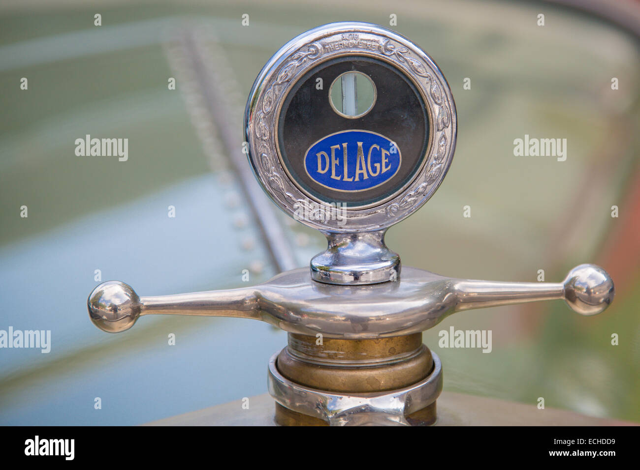 Radiator cap and water temperature gauge on a classic French Delage car ...