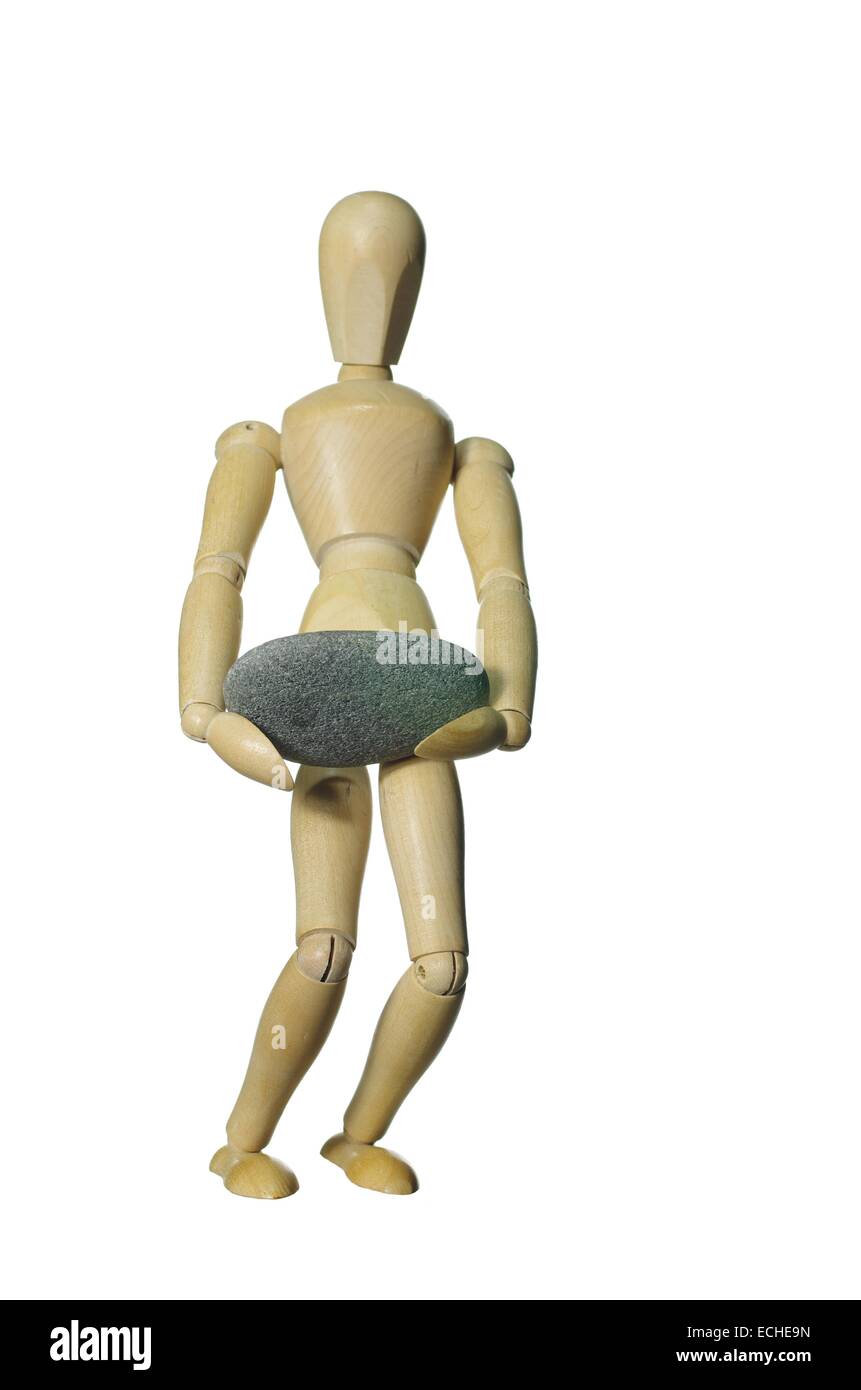 standing wooden dummy with stone on white background Stock Photo - Alamy